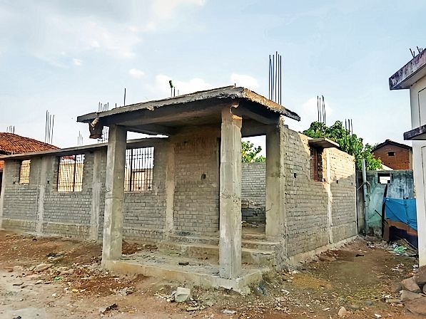 Community buildings are being built with cooperation, not government funds