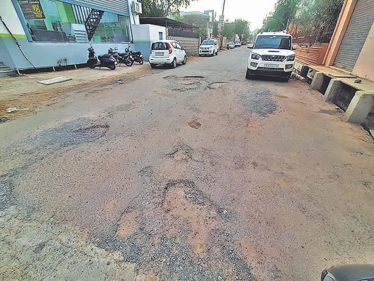 What kind of patchwork is this: Cement-concrete work on an asphalt road ...