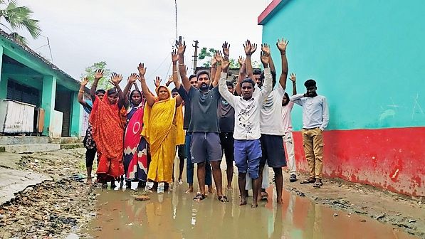 Waterlogging on the dilapidated road of Amwa Man Bazaar, protest