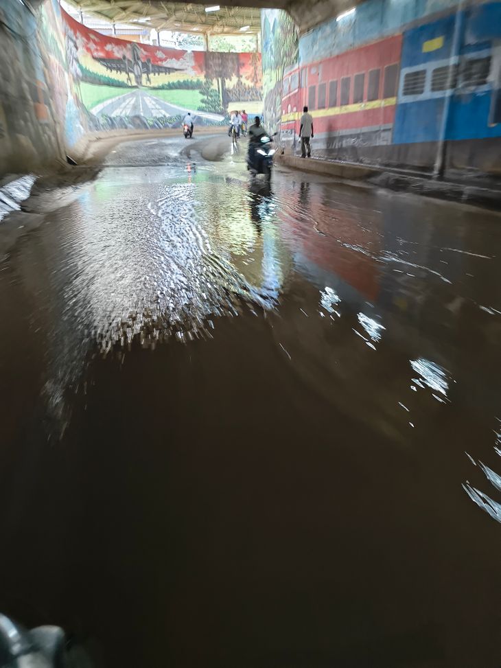 Waterlogging in railway underbridge due to rain, causing problems