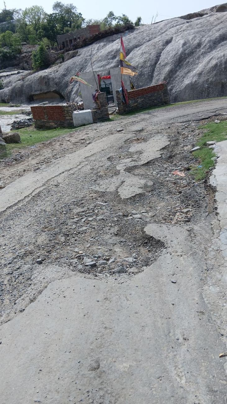 Damaged road causes problems for pedestrians