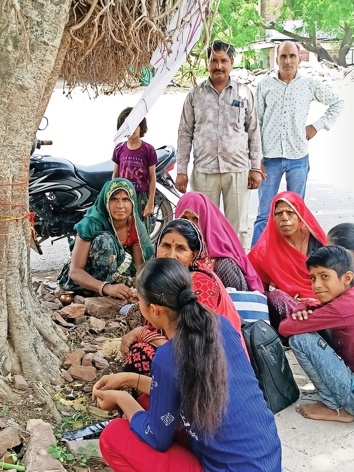 After worshipping the Peepal and Banyan trees, the women listened to ...