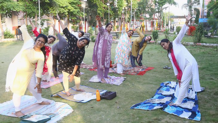 On Yoga Day, women pledged to practice yoga regularly.