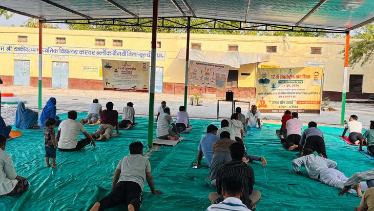 Group yoga practice in Karwar