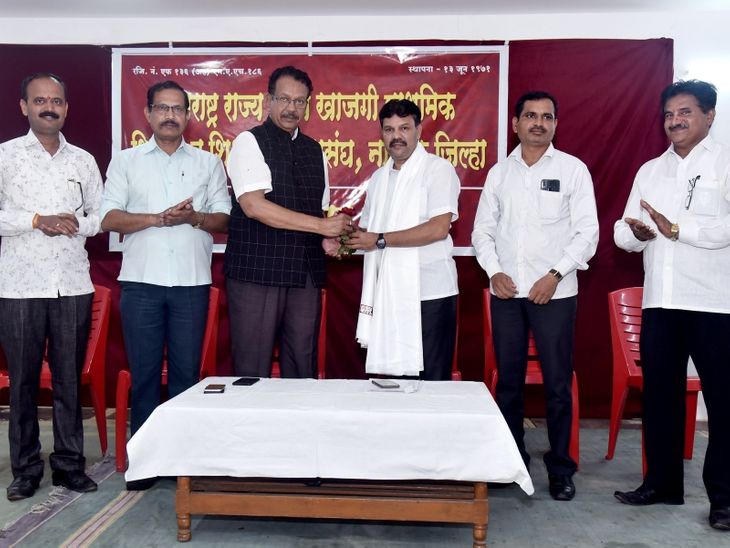 Nandlal Dhande unopposed as District President, Rajendra Nikam as ...