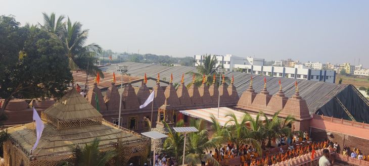 Installation of 175 golden urns on temples in Janashanti Dham, urn on ...