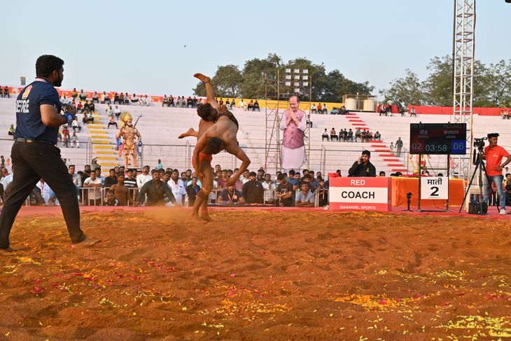 The arena was decorated and the wrestlers beat the shaddu, the ...