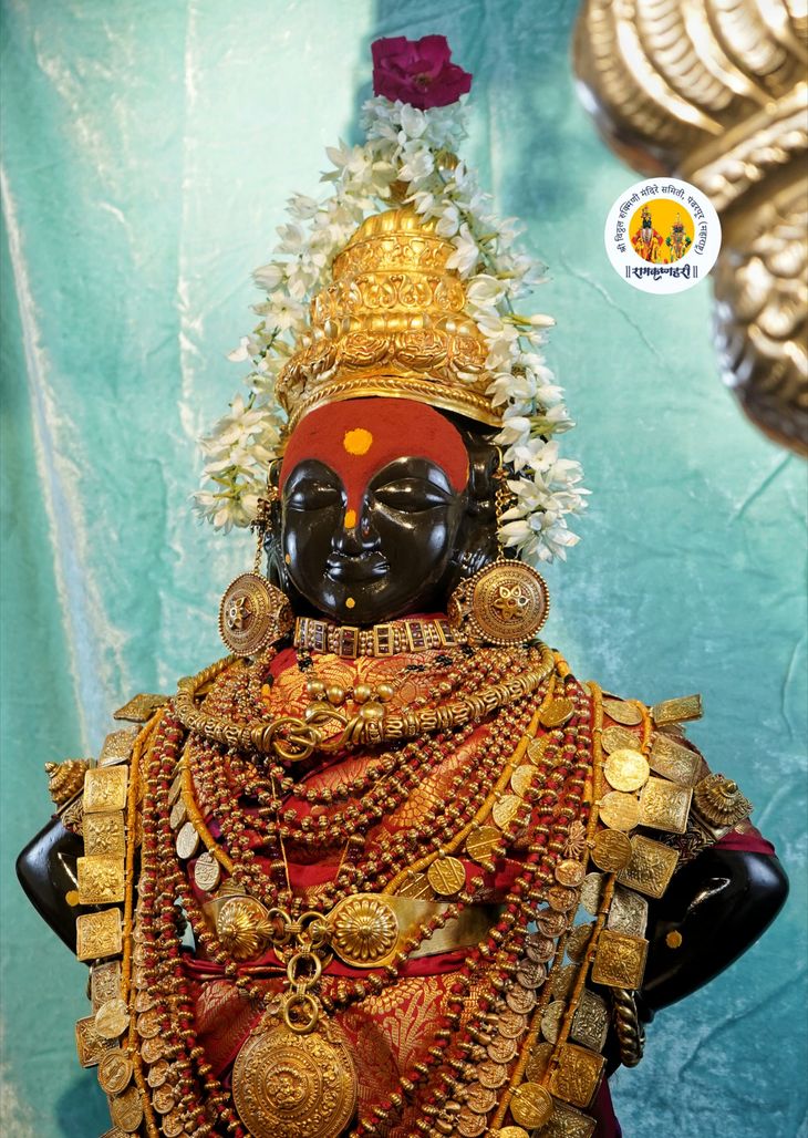 Shri Vitthal is adorned with ornaments and Rukmini is dressed in attire ...