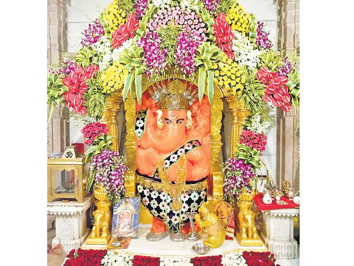A crowd of devotees gather at the Ganeshpura temple in Dholka, a ...