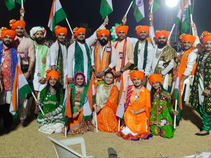 The garba group, painted in patriotic colours, carrying the tricolor in ...