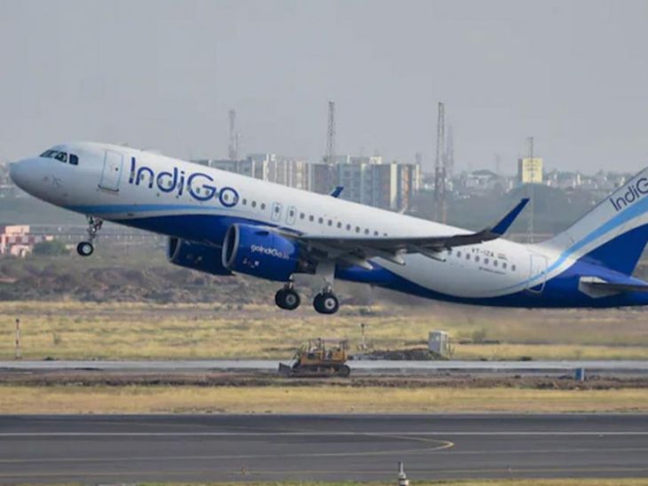 An Indigo plane touches the runway and takes off suddenly