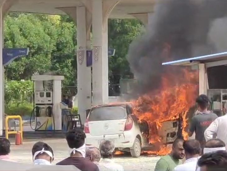 A CNG car suddenly caught fire at a petrol pump on Detroj Road in Kadi ...