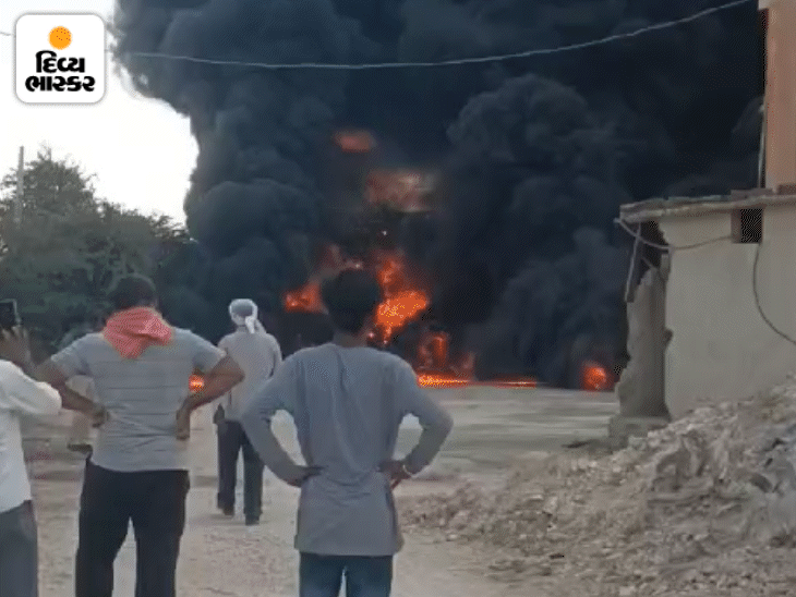 A fire broke out in a pile of oil barrels lying in an open plot at ...