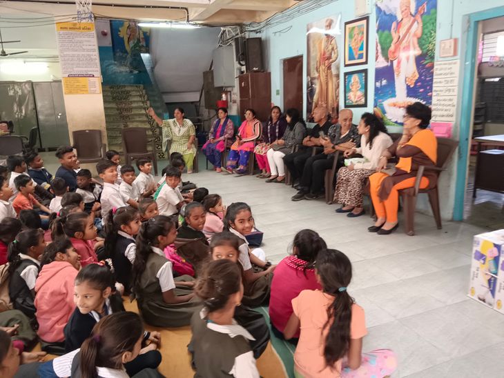 Distribution of lunch boxes and packets of biscuits in Chhatrapati ...