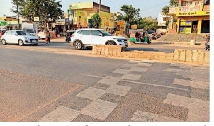 The new fencing poles erected in the divider on Radhanpur Road were ...