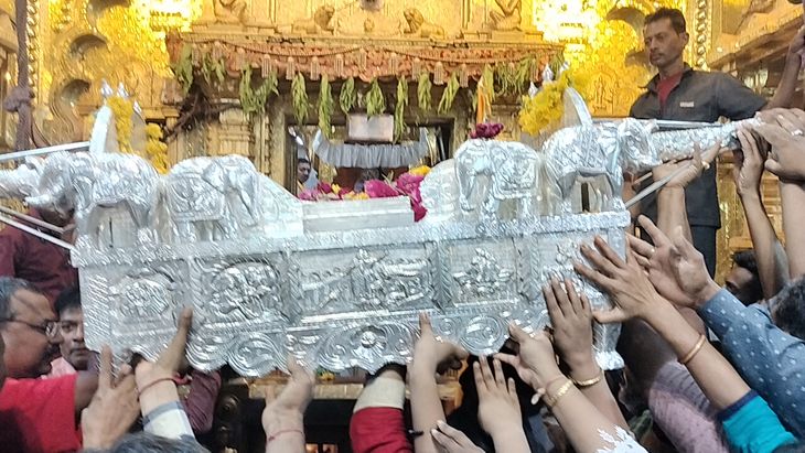 An 8 kg silver palanquin was offered to the Lord by the devotees in ...