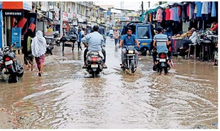 In Radhanpur town, the road to the main market was flooded, leaving ...