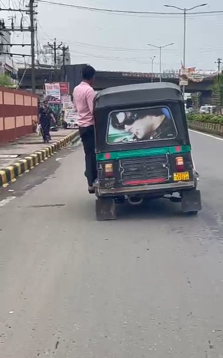 A youth doing a dangerous stunt in a rickshaw near Ashadham School in ...