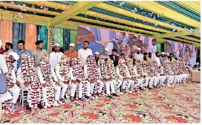 51 brides and grooms get married in a mass wedding celebrated by the ...