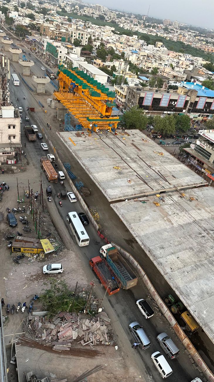 A 120-ton span for the elevated corridor is being installed every one ...