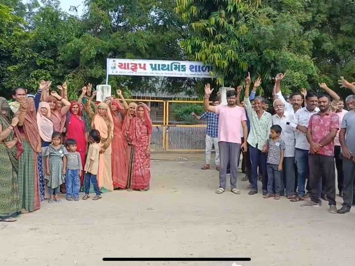 Villagers protest against the decision to close the old school in ...