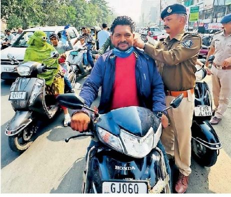 Neck bands distributed at Tulsidham Char Rasta, Manjalpur | નેક ...