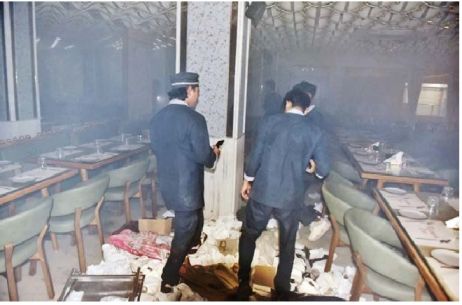 Running around as smoke rises from the upper floors