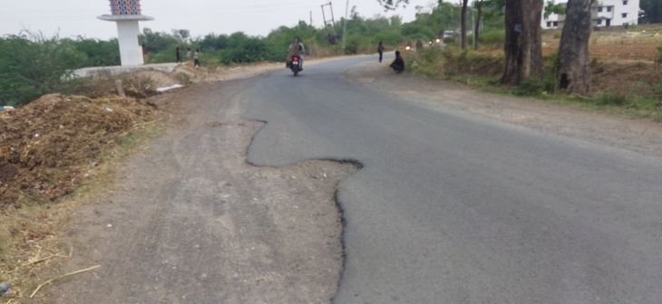 Repair the dilapidated Vatrak Colony road.