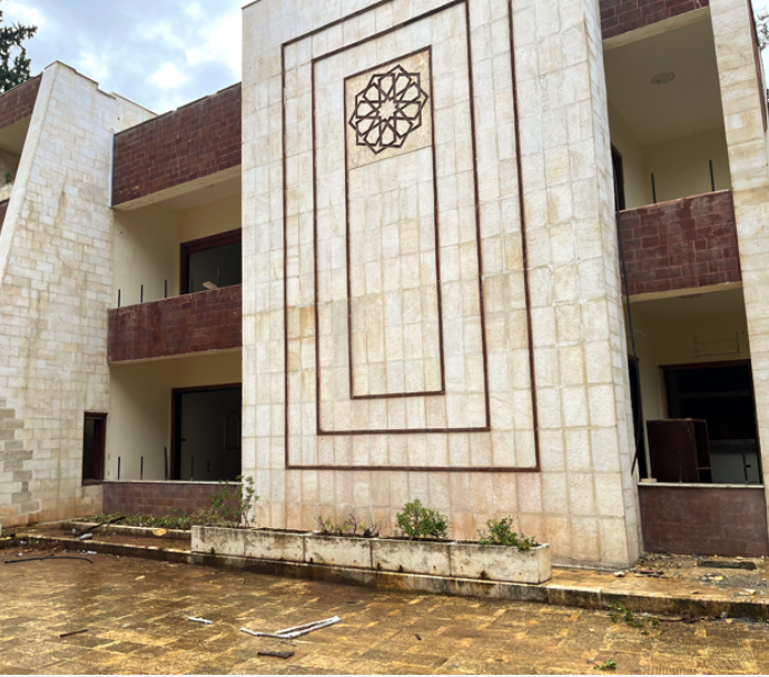 People looted everything from Assad's palace including doors, windows