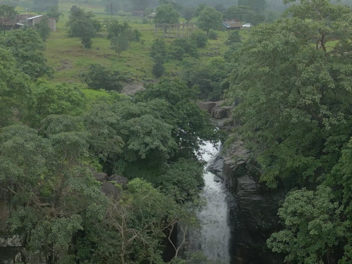 Drone view of Dahel waterfall plunging 300 feet,300-foot waterfall with ...