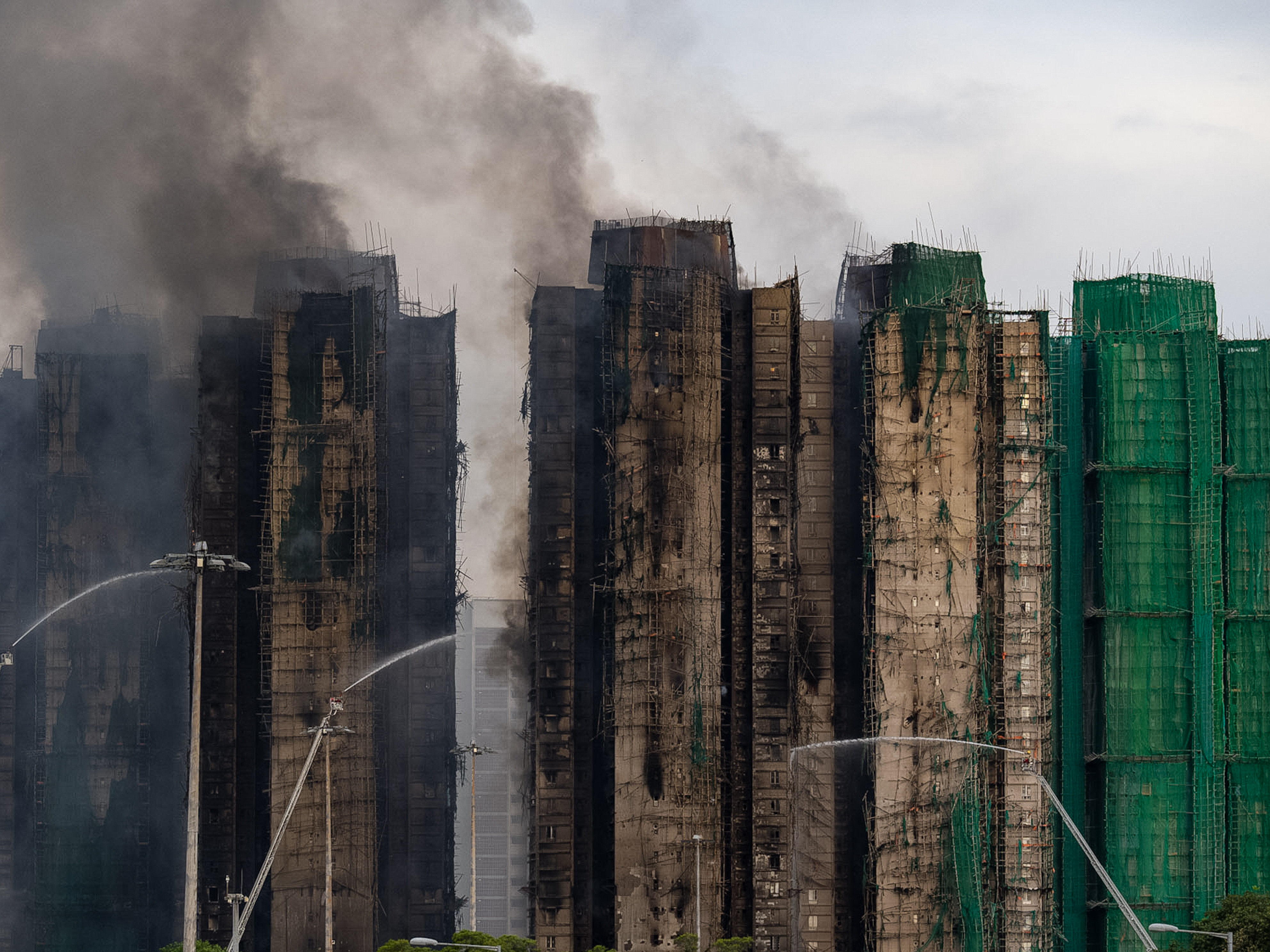 Hong Kong’s deadliest fire in 77 years kills 65; Nearly 300 missing ...