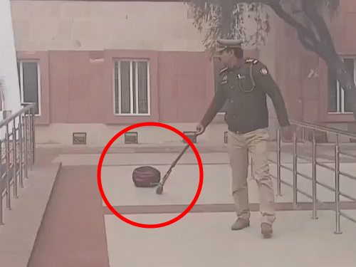 Bomb threat triggers panic at Mau railway station: Cop drags suspicious ...