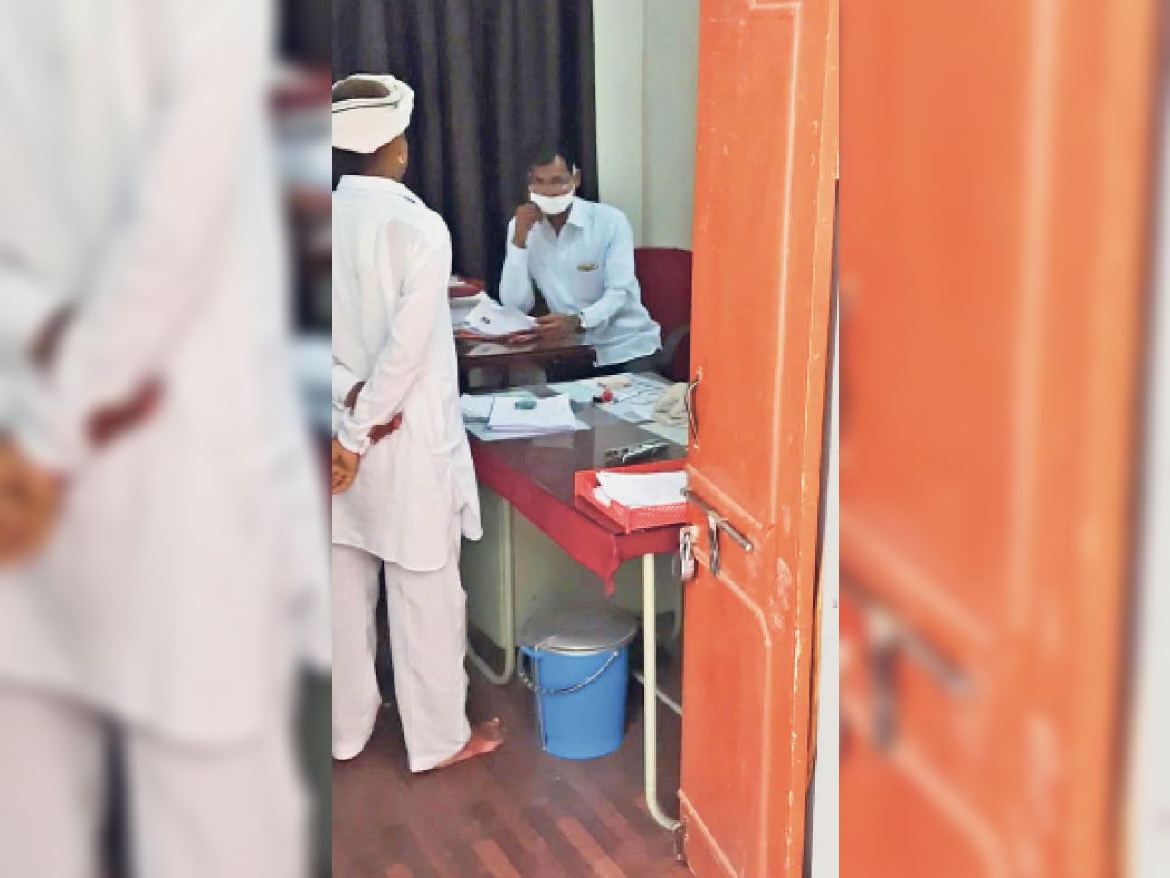 The lady sarpanch's uncle father-in-law sits on the sarpanch's chair ...