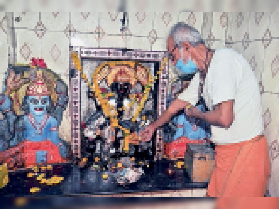 The priests anointed Shani Dev, the god of justice, with a mask ...