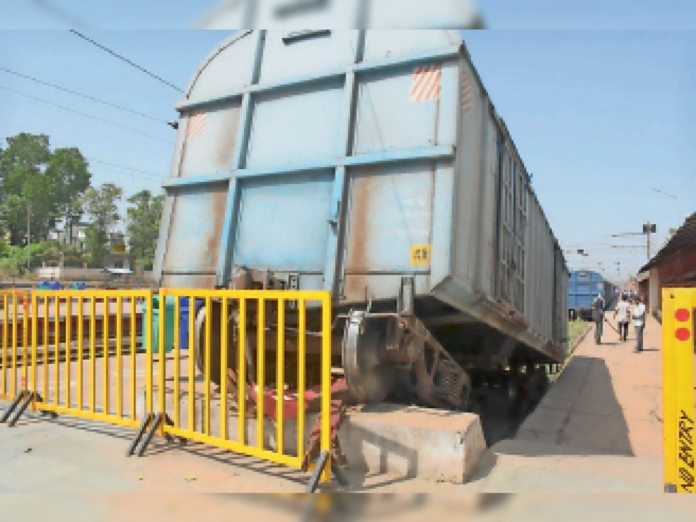 The last bogie of the goods train arrived for loading of wheat climbed ...