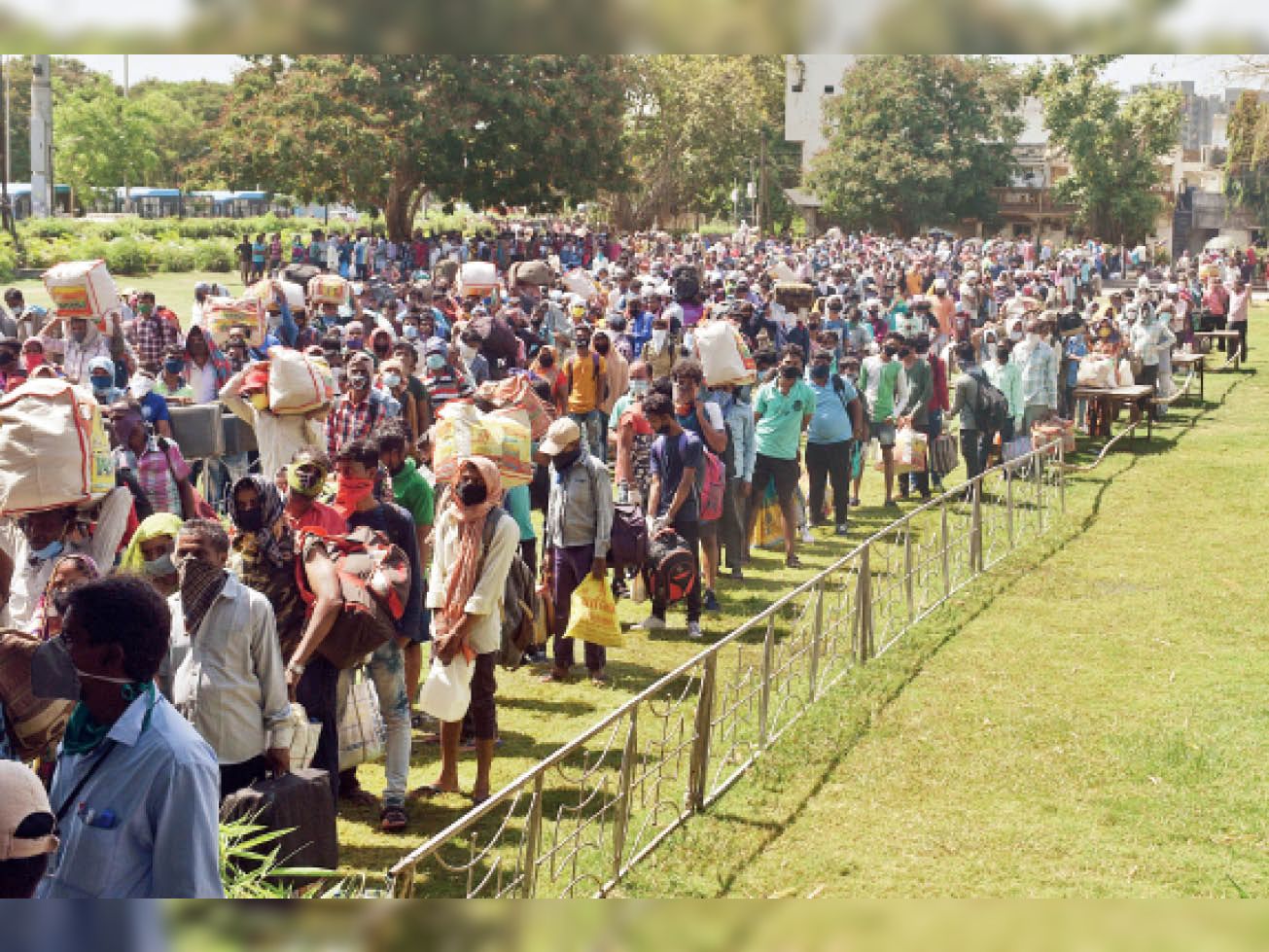 People standing in line for hours for bus to go to the station in 40.6 ...