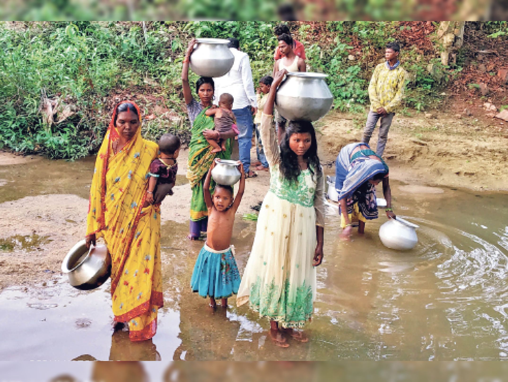 The people of Kunda bring drinking water from Chuan and river half a km ...