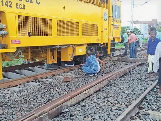 Rail track packing machine baptized during ballast packing on new ...