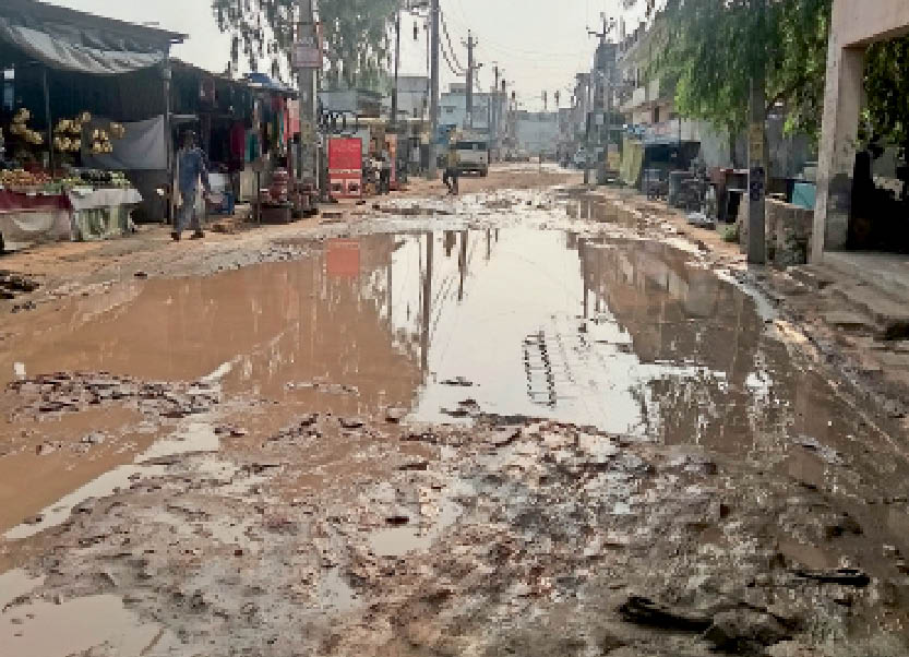 Road not paved after putting drain line, now it is in rain