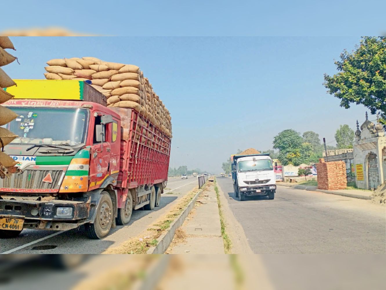 Trucks loaded with paddy bags are running overloaded on the National ...