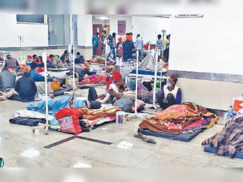 70 serious neuro patients in 20 bed ward, treatment being done on floor ...