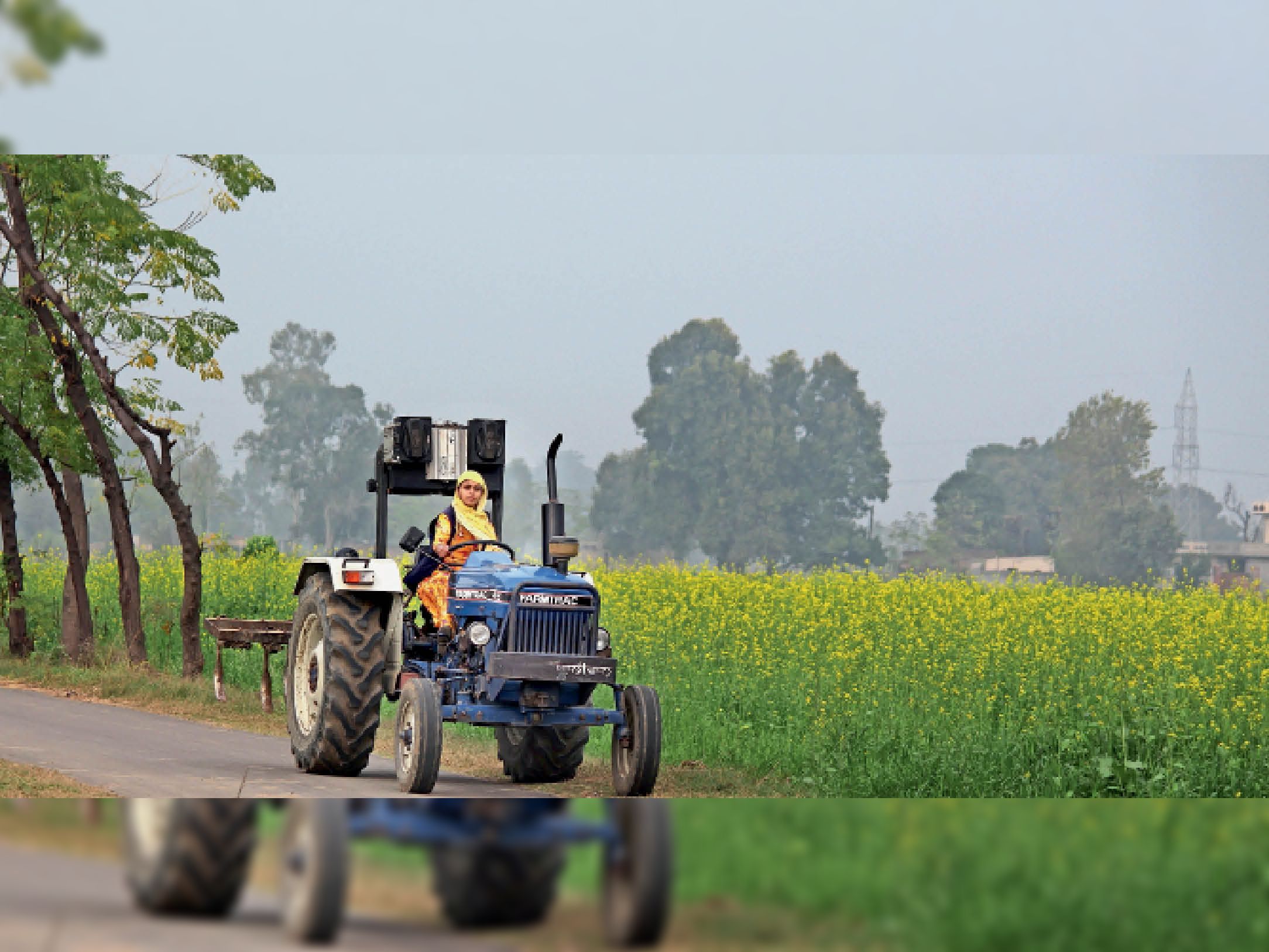 Family sitting in farmer movement, 12th Manpreet Kaur driving tractor ...