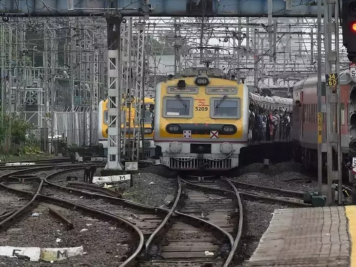 The Bandra Terminus-Ramnagar Express, split in two running on the track ...