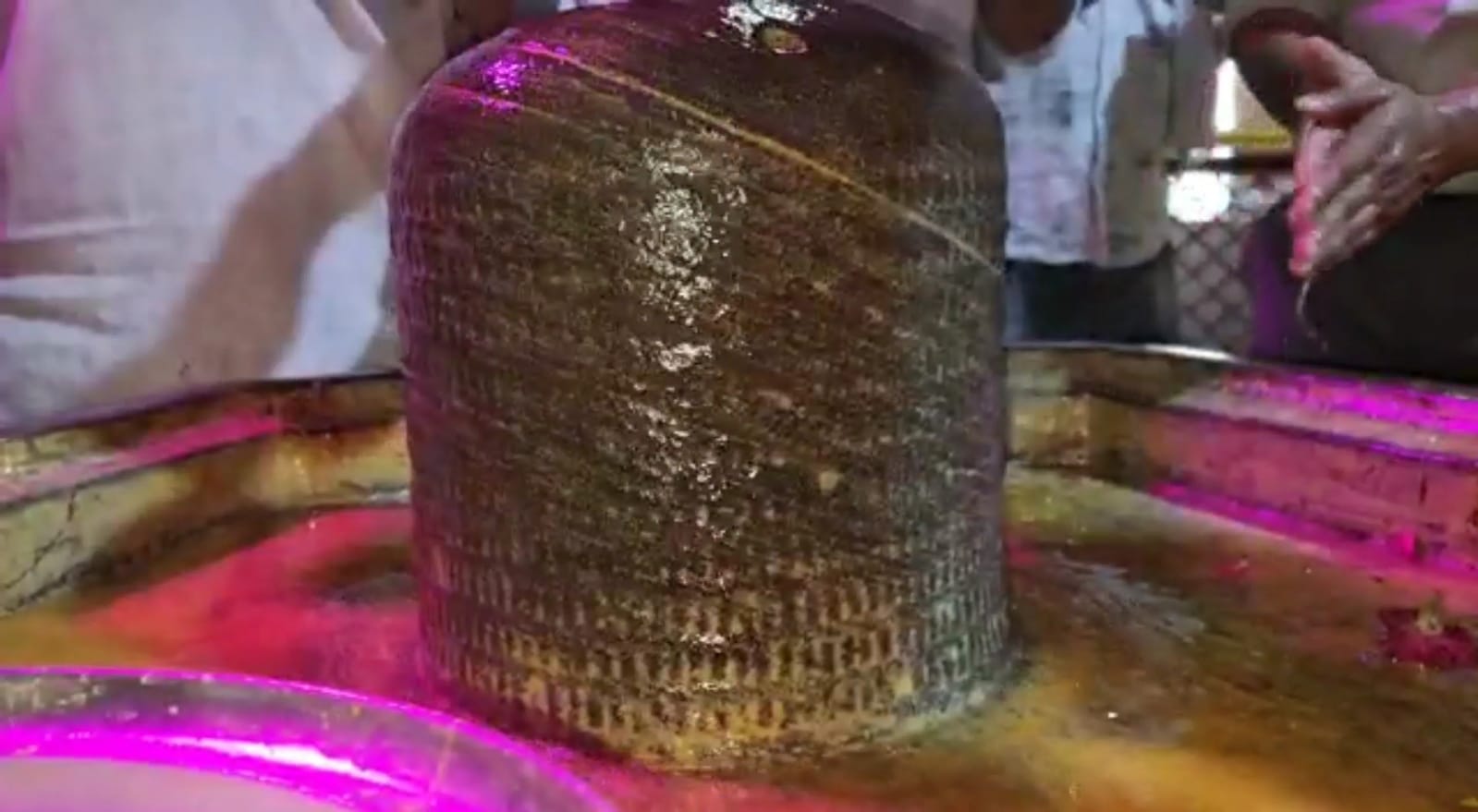 Anxiety is removed by offering a lot of water on this Shivling of ...