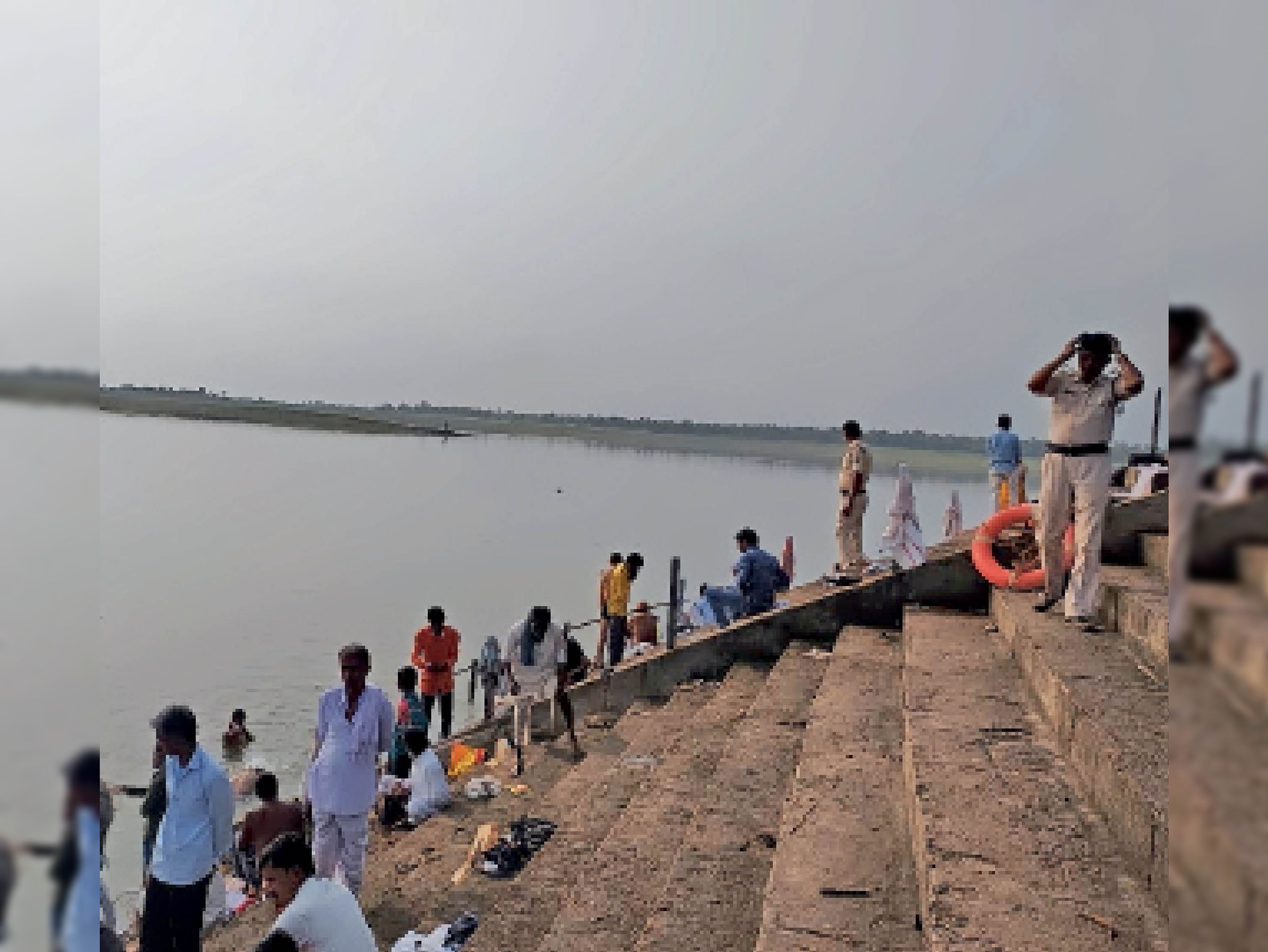 Devotees take a dip in the backwaters of Sant Singaji, after bathing ...