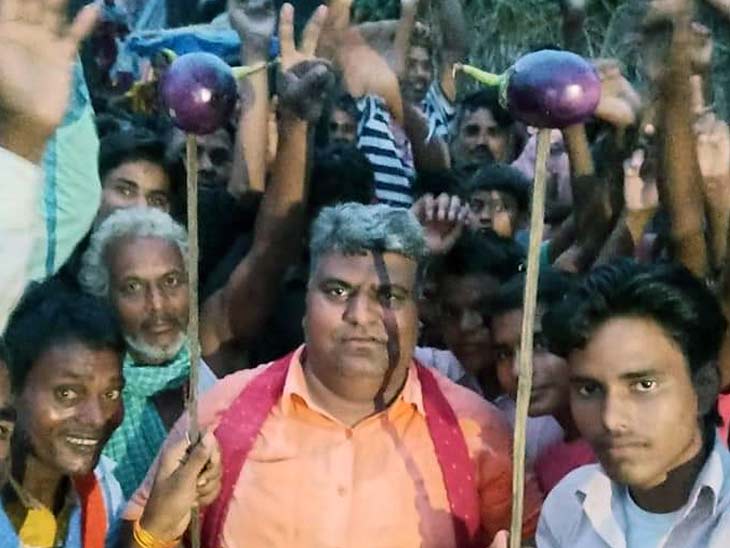 For campaigning in Panchayat elections, the candidate is carrying the ...