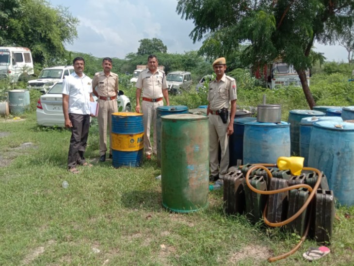 Large plastic drums were hidden among the clumps of trees, 540 liters ...