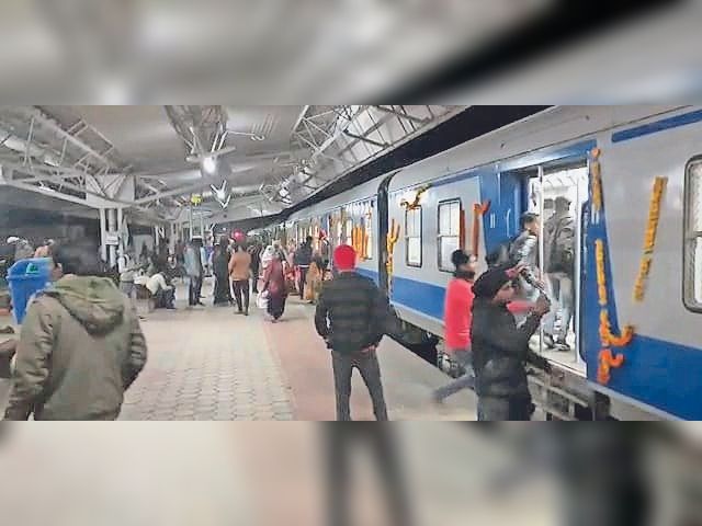 People welcomed the MEMU train that arrived at the station for the ...