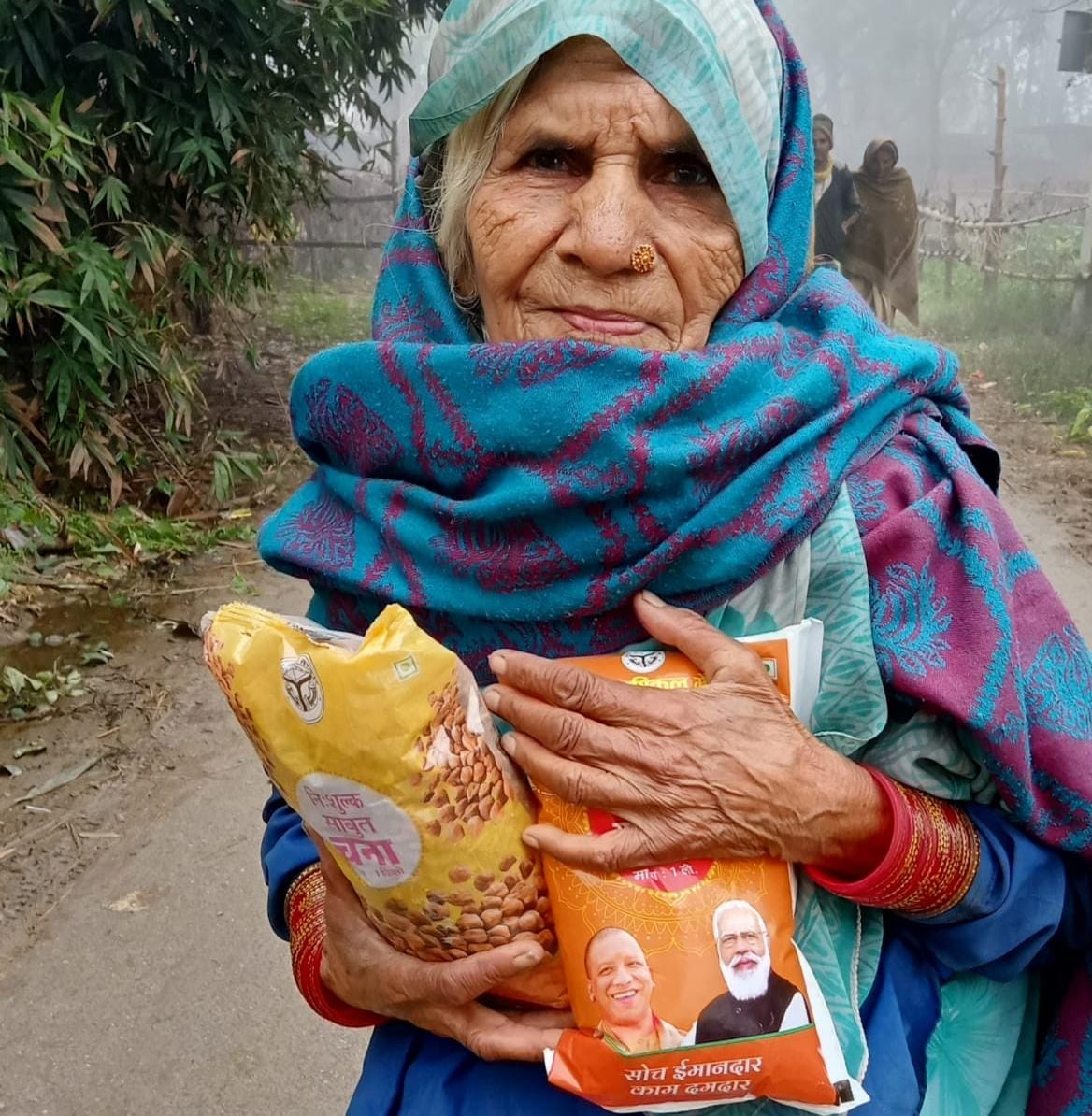 Gram, salt and oil were distributed in packets containing photos of ...