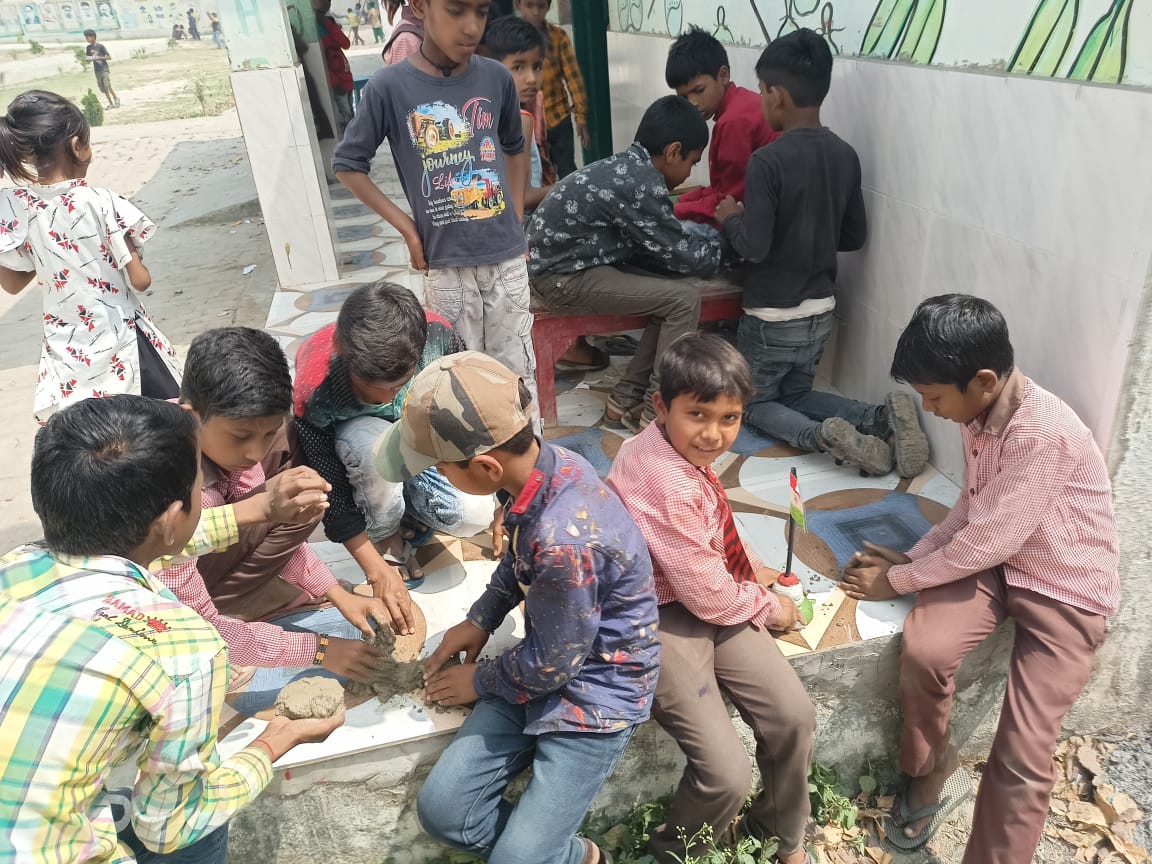 Children of English Medium Primary School made earthen pots and girls ...